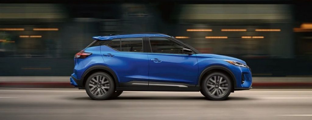 Nissan blue exterior on road - Billion Auto Group